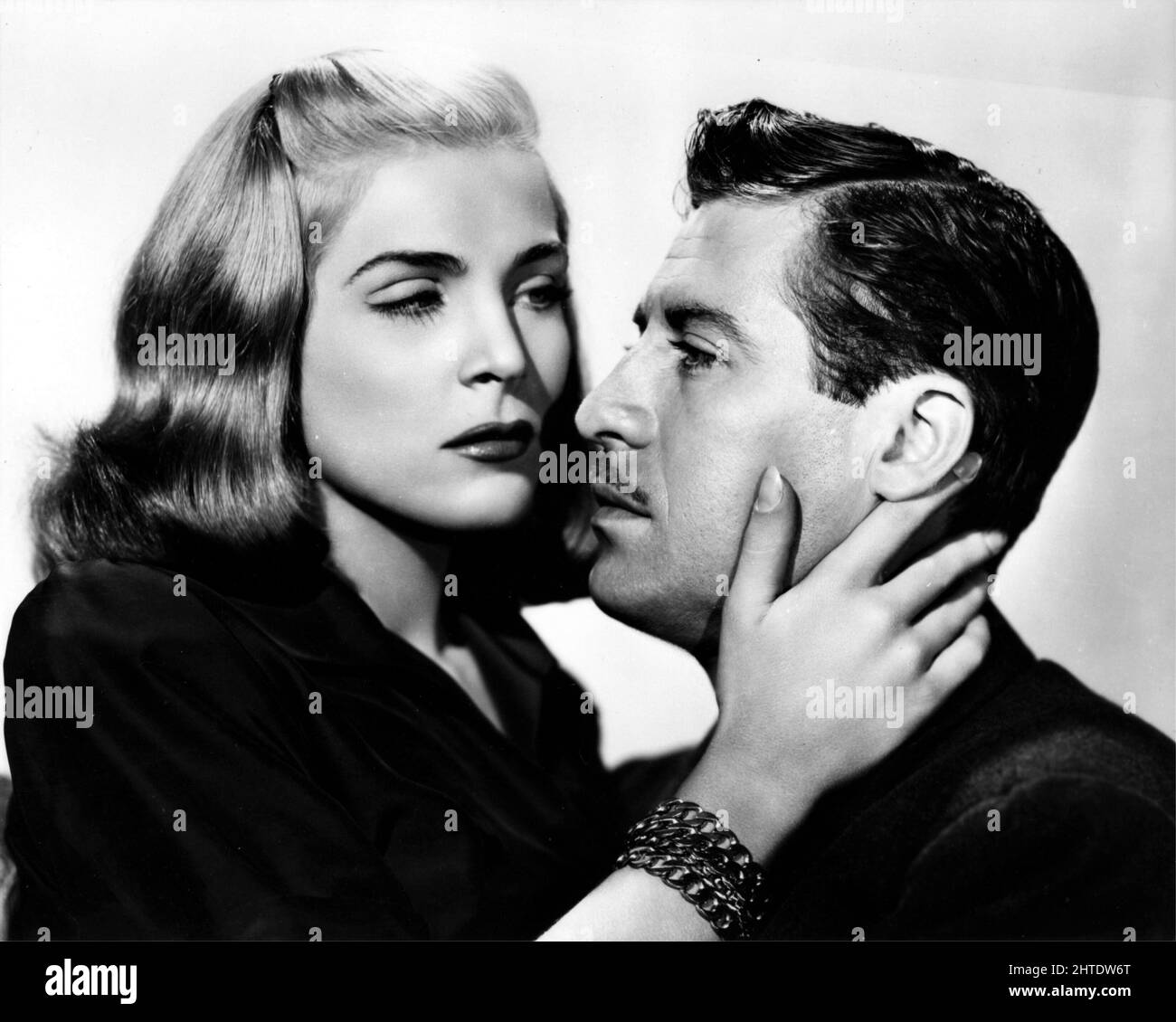 JOHN HODIAK and LIZABETH SCOTT in DESERT FURY (1947), directed by LEWIS ...