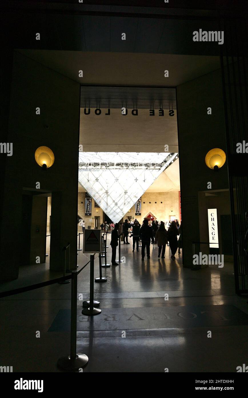 Inverted glass pyramid inside underground department store under the ...