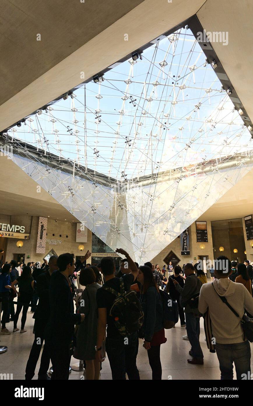 The inverted glass pyramid inside an underground store under the ...