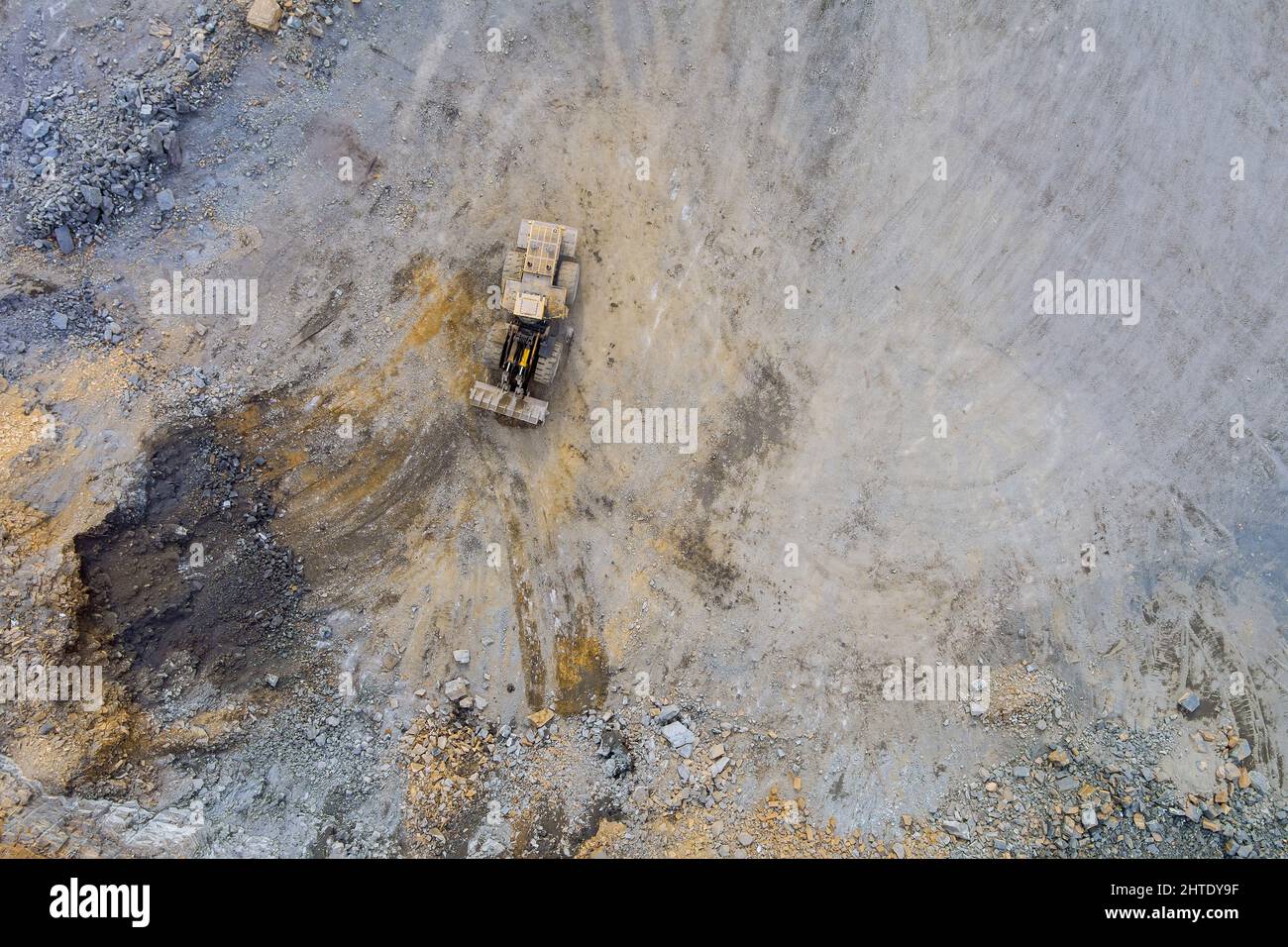 Work the excavator in an open pit the inside a granite quarry Stock ...