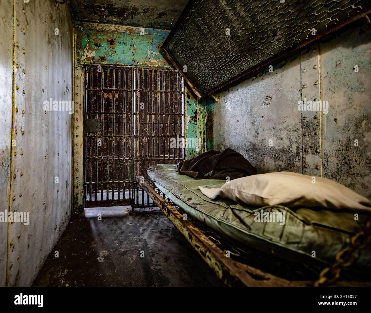Photo of a rustic metal room in the prison Stock Photo - Alamy