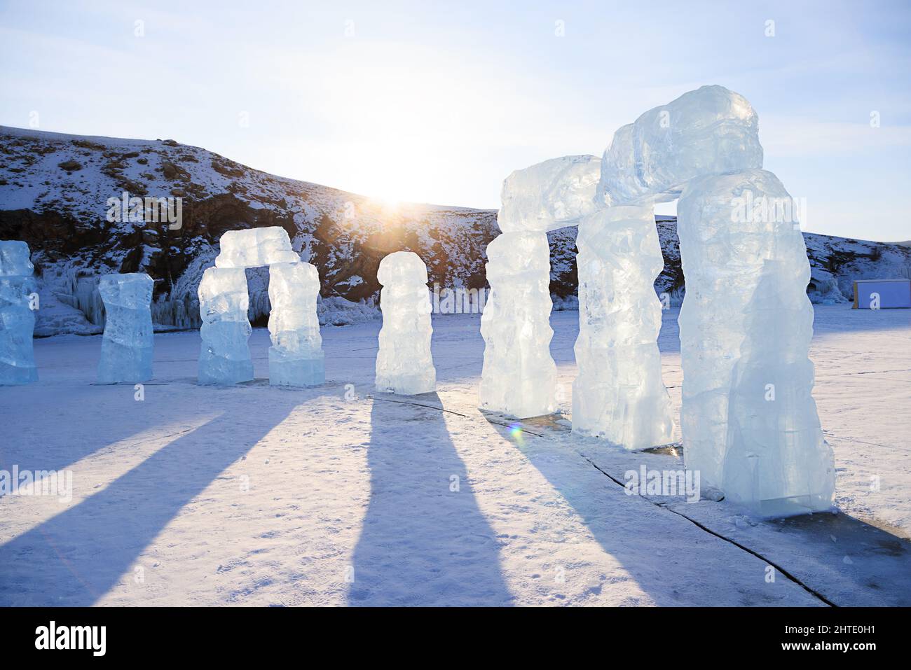 Ice blocks in the rays of the sun on the shore of the frozen lake ...