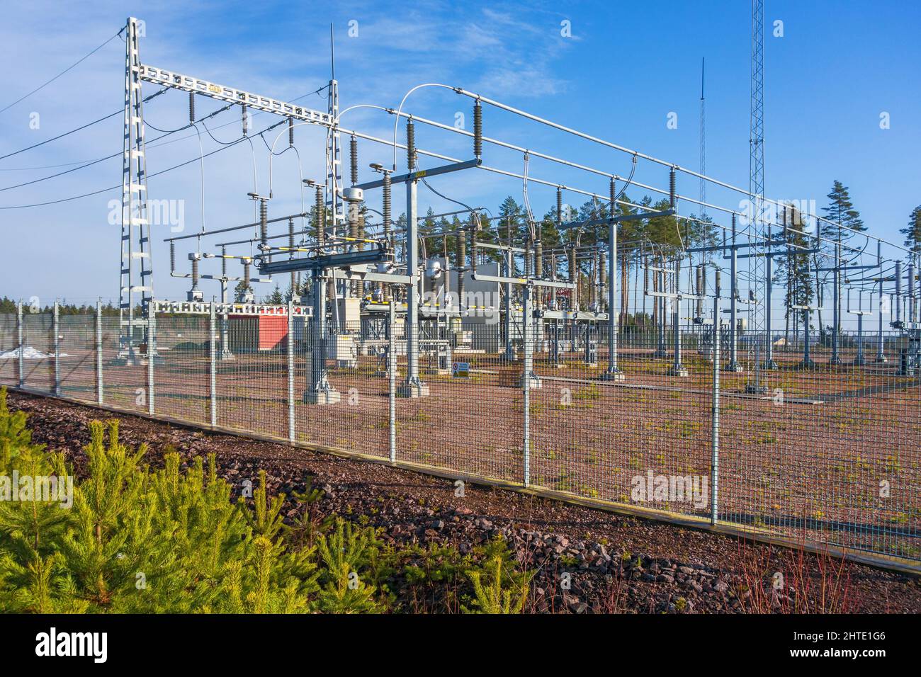 Electrical power station by a forest Stock Photo - Alamy