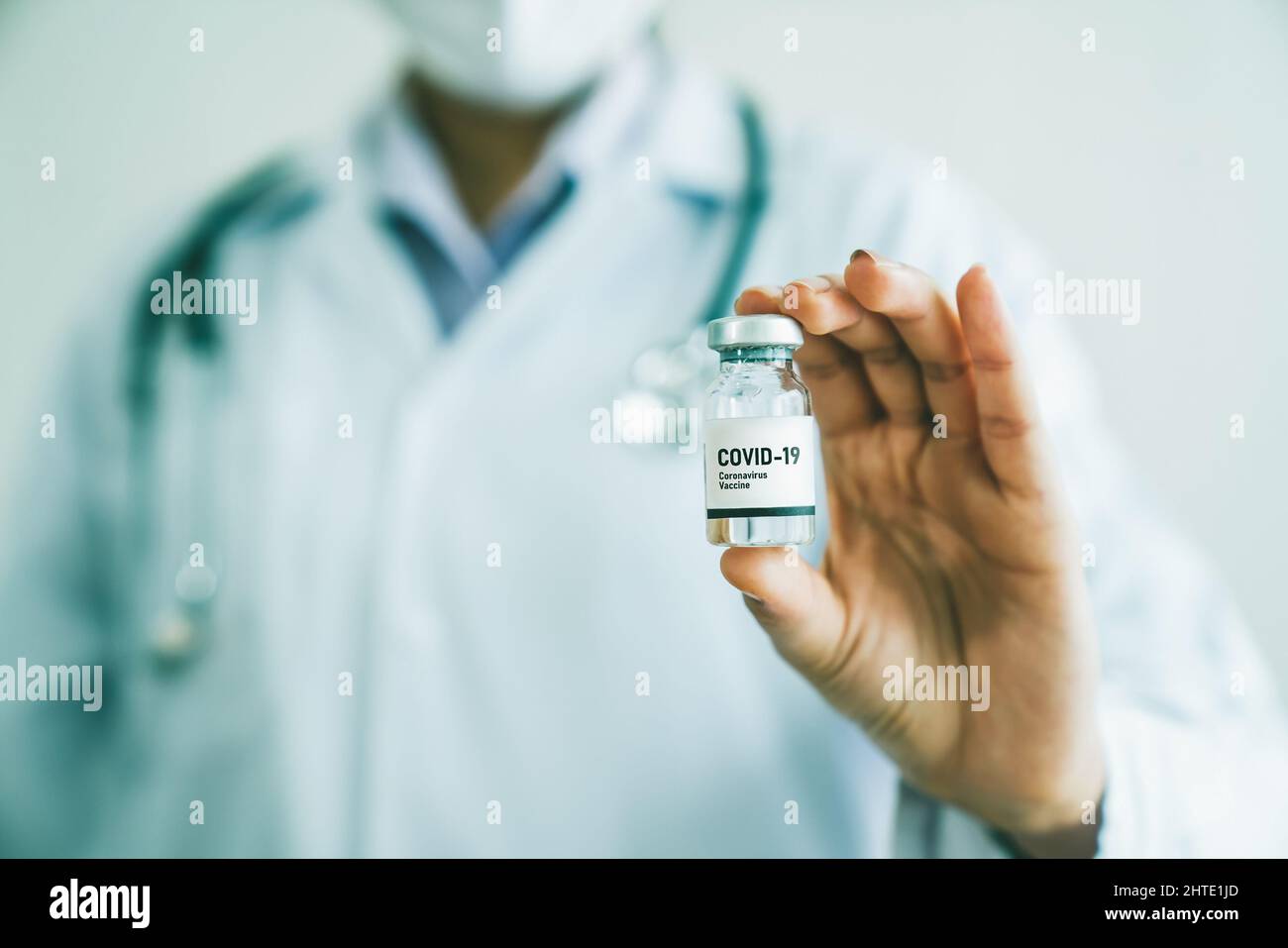 Skillful doctor prepare vaccine proficiently before injection . Covid ...