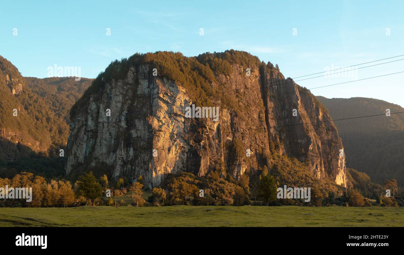 Photo of a high rock stands by the Rio Simpson in the Rio Simpson ...