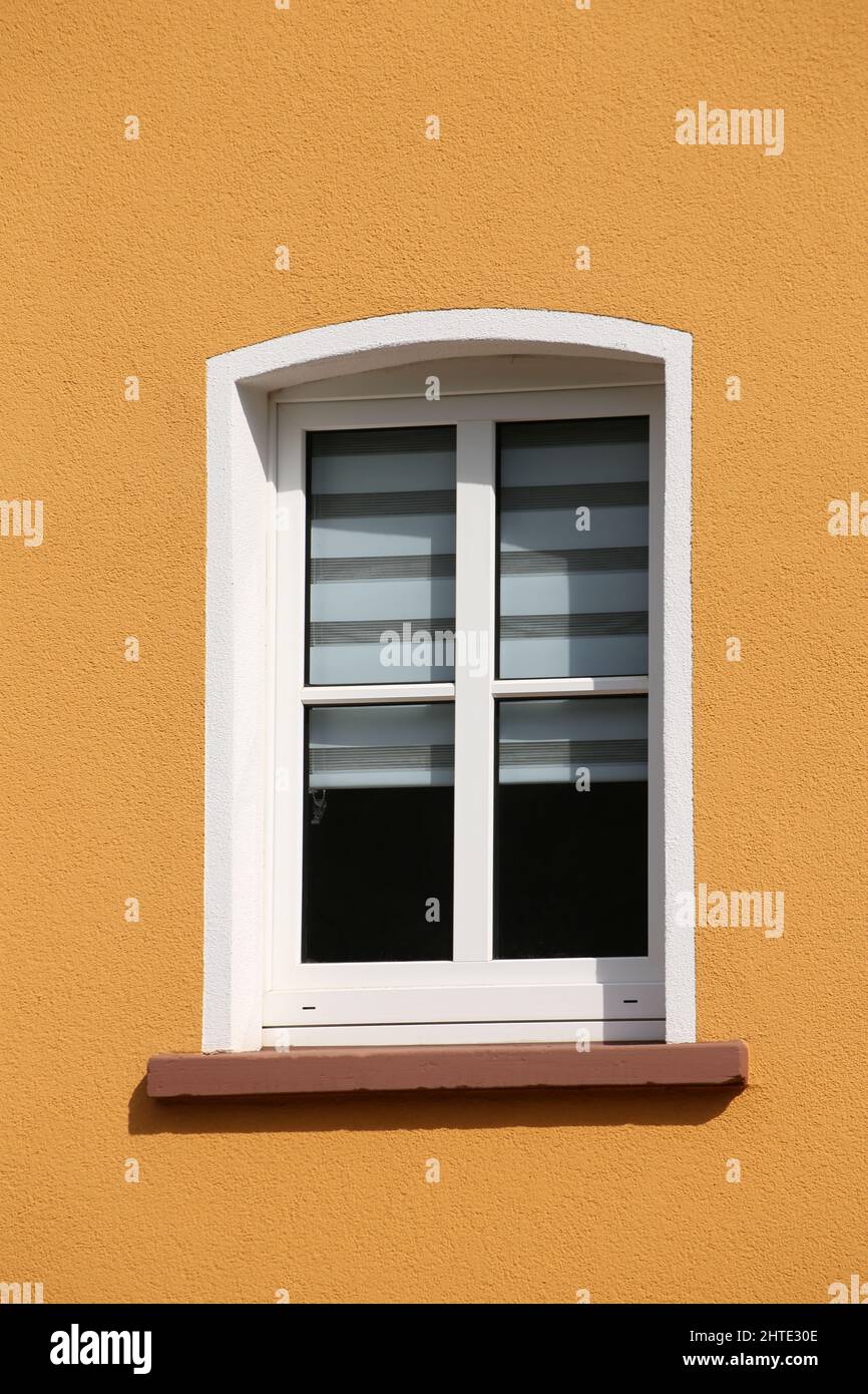 New plastic muntin windows on an old building Stock Photo - Alamy