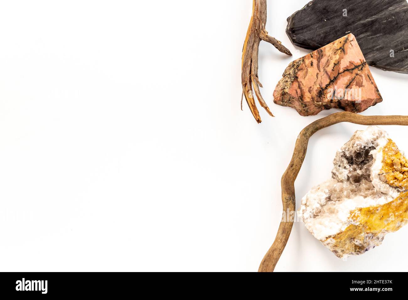 Background of natural crystal stone mineral with snag tree branch Stock ...