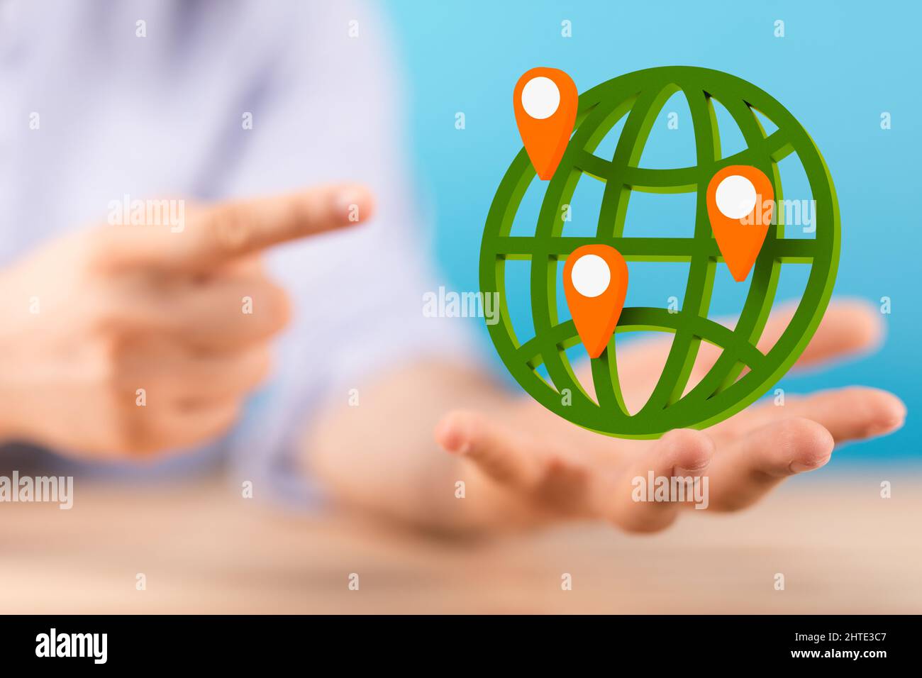 Person pointing at a save the clean green planet - ecology concept ...