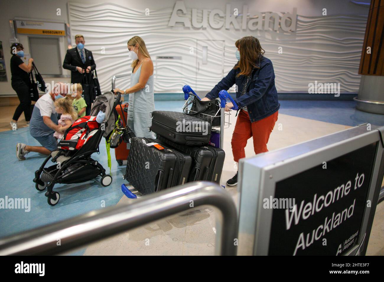 Auckland. 28th Feb, 2022. People arrive at International Arrivals of ...