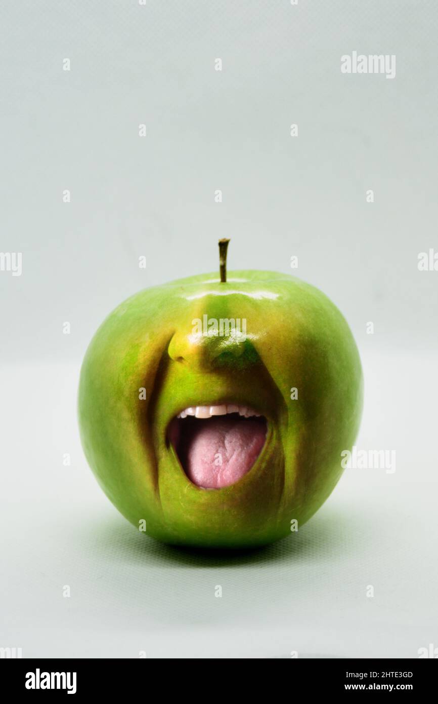 Green apple with a funny face isolated on white background - great for ...