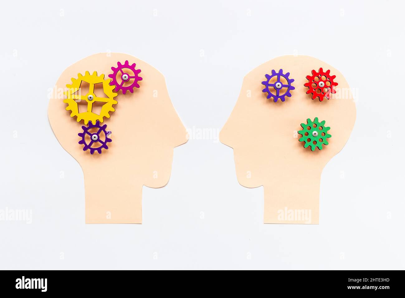 Brain gears on two human heads. Mind work. Brain chaos and mind peace ...