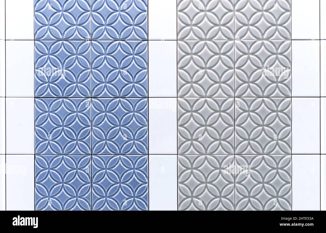Gray and blue ceramic tiles with a round pattern Stock Photo - Alamy
