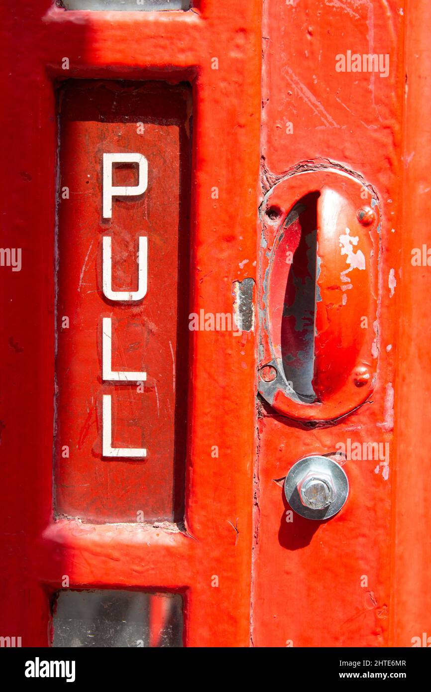 Closeup shot of an old British telephone booth handle Stock Photo - Alamy