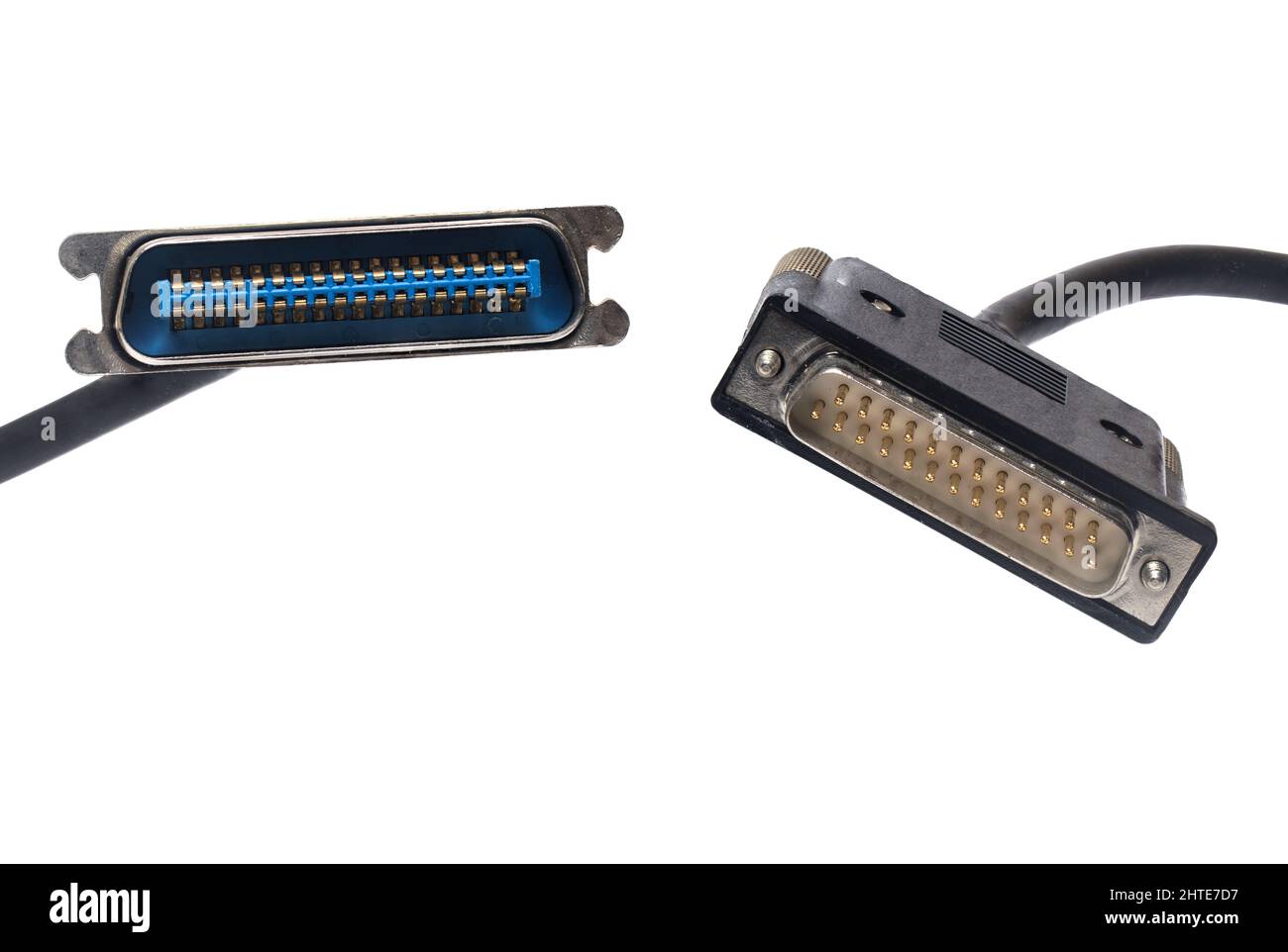 Close up of two obsolete serial computer connectors on white background ...