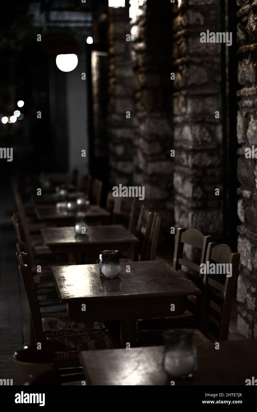Monochrome shot of an empty restaurant at night in dim lights Stock ...
