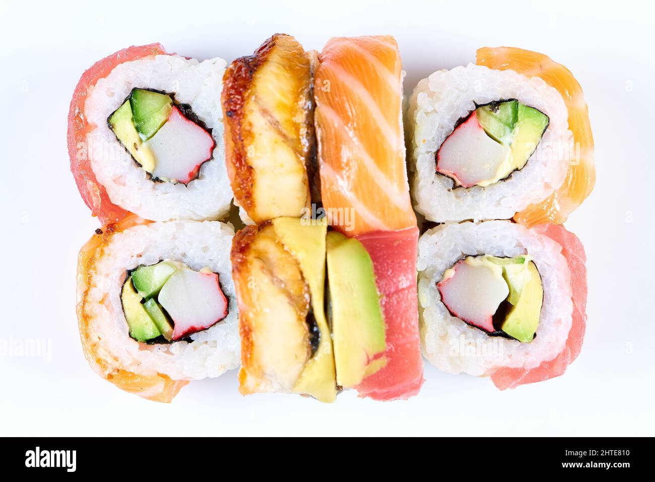 Top view of sushi nigiri, maki, sashimi rolls isolated on a white ...