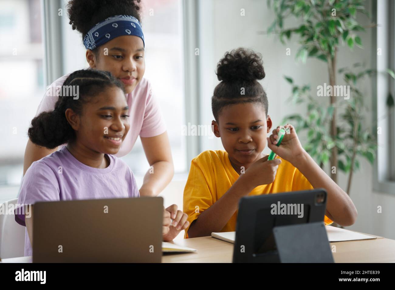 Diverse children playing in classroom hi-res stock photography and ...