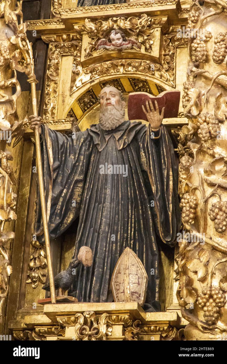 Low angle shot of statue of a saint inside the church of the Monastery ...