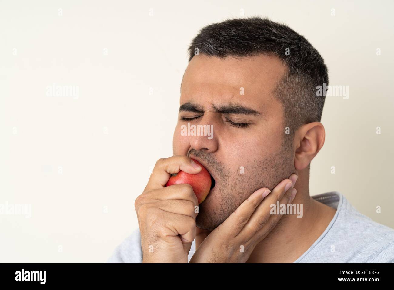 Close up photo of man with toothache or teeth pain. Concept of oral or ...