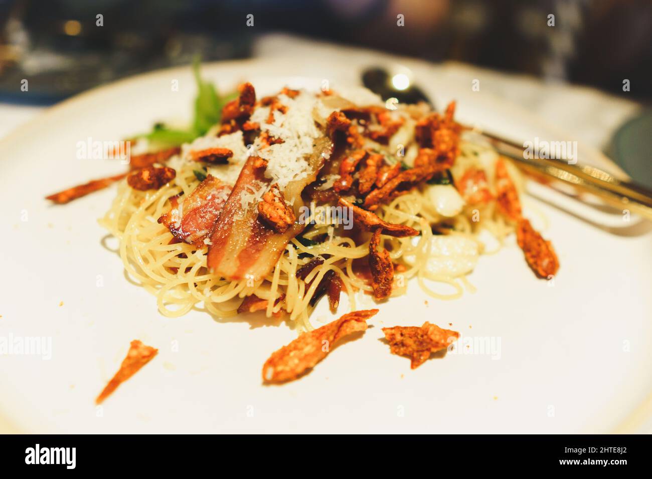 Angel hair with bacon and dried chilli Stock Photo - Alamy