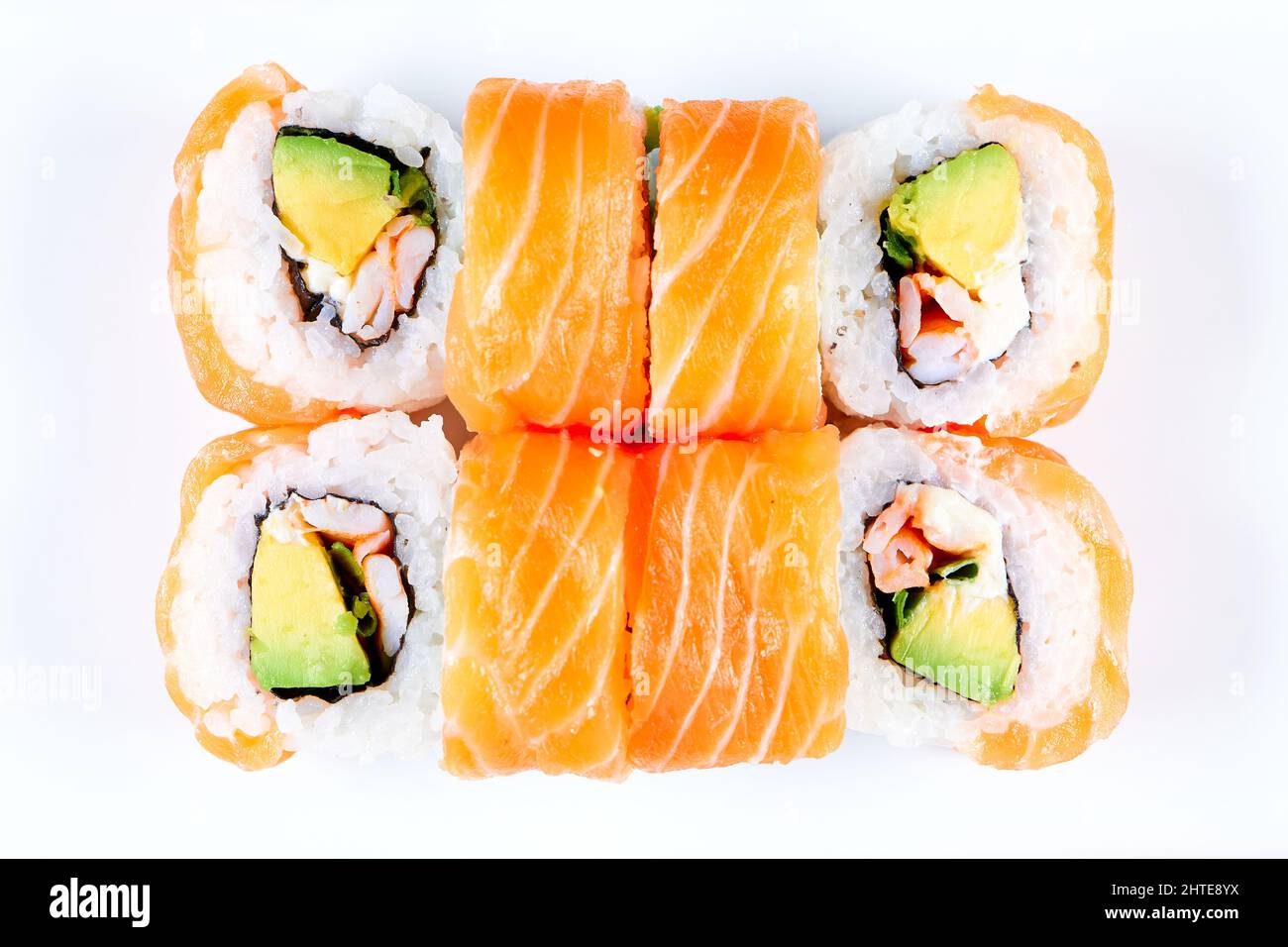Top view of sushi nigiri, maki, sashimi rolls isolated on a white ...