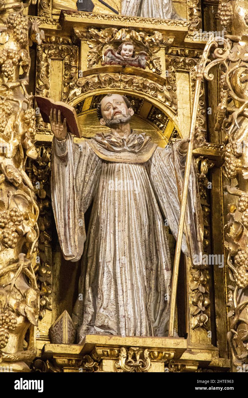 Low angle shot of a statue of a saint inside the church of the ...