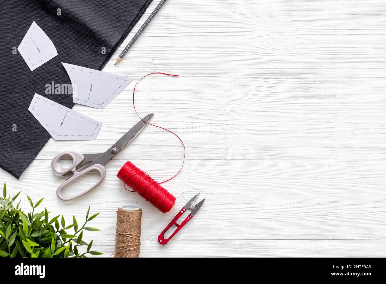 Tailoting - clothing sewing fabric with dress patterns, top view Stock ...