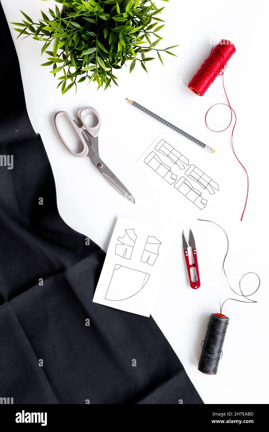 Tailoting - clothing sewing fabric with dress patterns, top view Stock ...