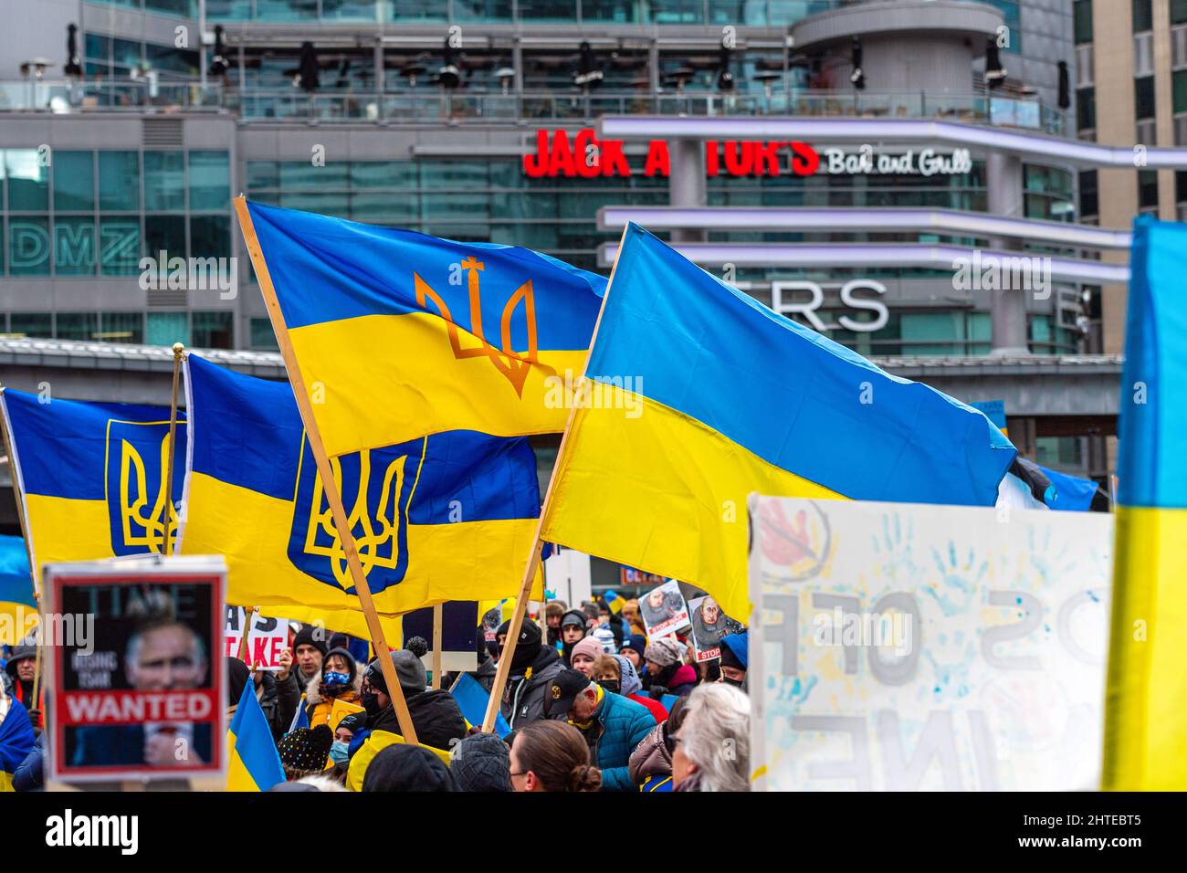 Toronto, Canada - February 27, 2022: Group of Ukrainian flags held by a ...