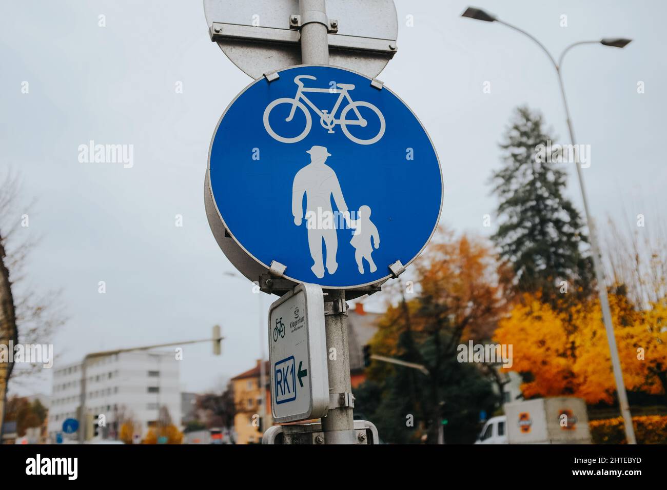 Pedestrian and bike path signs on a street in Austria Stock Photo - Alamy