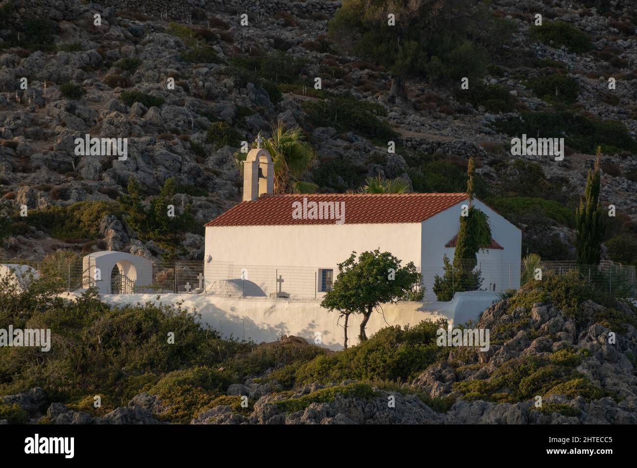 White building in a mountain, Crete Stock Photo - Alamy