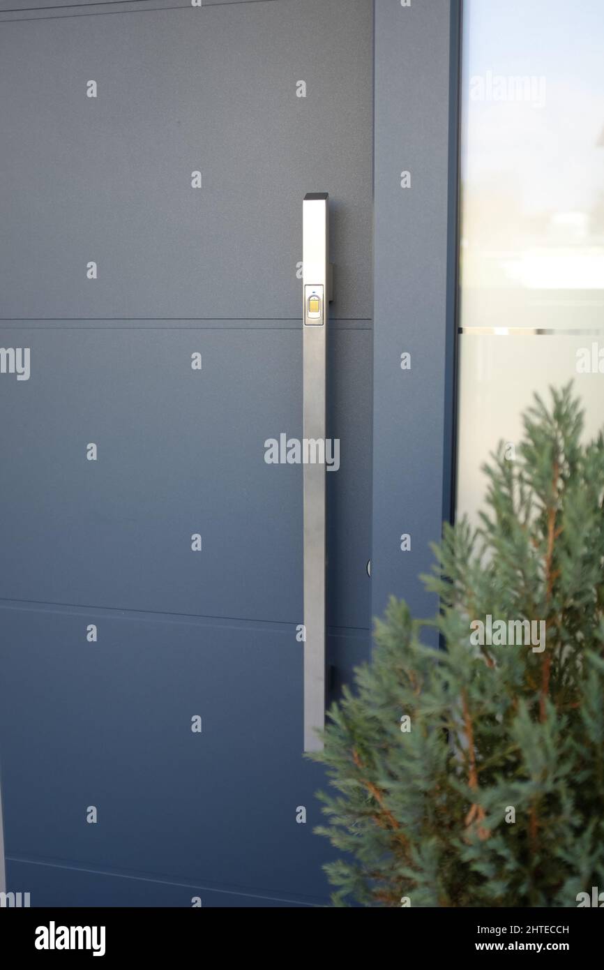 Vertical shot of a fire door with a big metal handle Stock Photo - Alamy