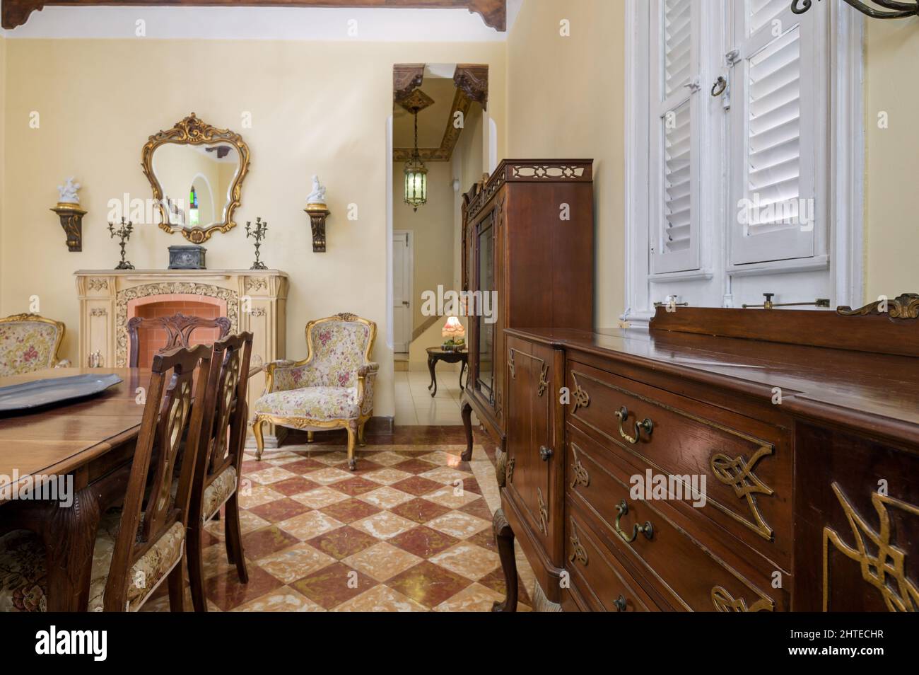 Details from a dining room with woodwork furniture in a classic home ...