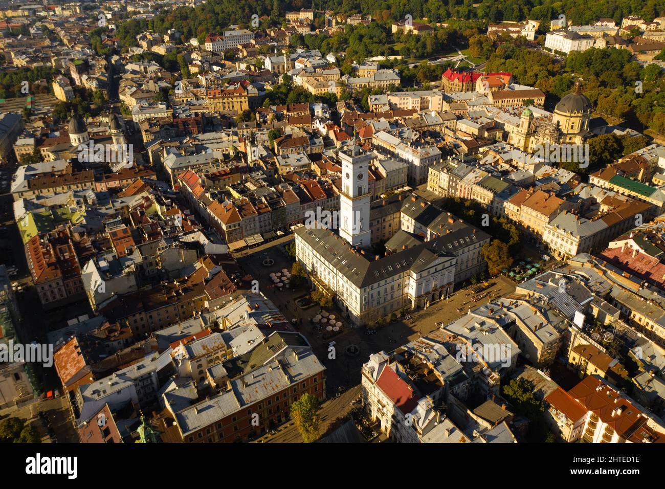 Urban landscape of the city of Lviv at sunset, streets and red roofs of ...