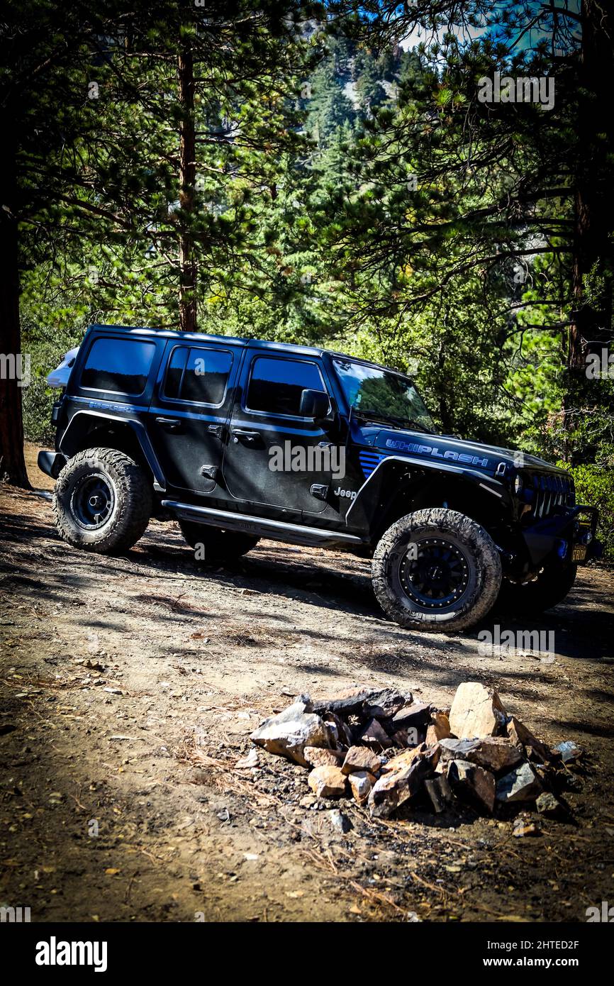 Vertical shot of an off-road Jeep Wrangler car in a parking lot Stock ...