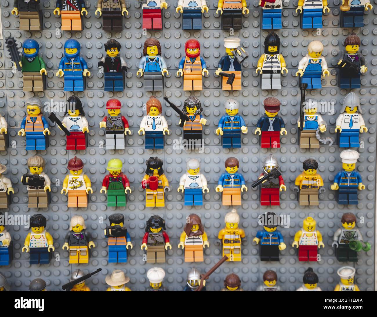 Famous Lego characters on a board in the shop Stock Photo - Alamy