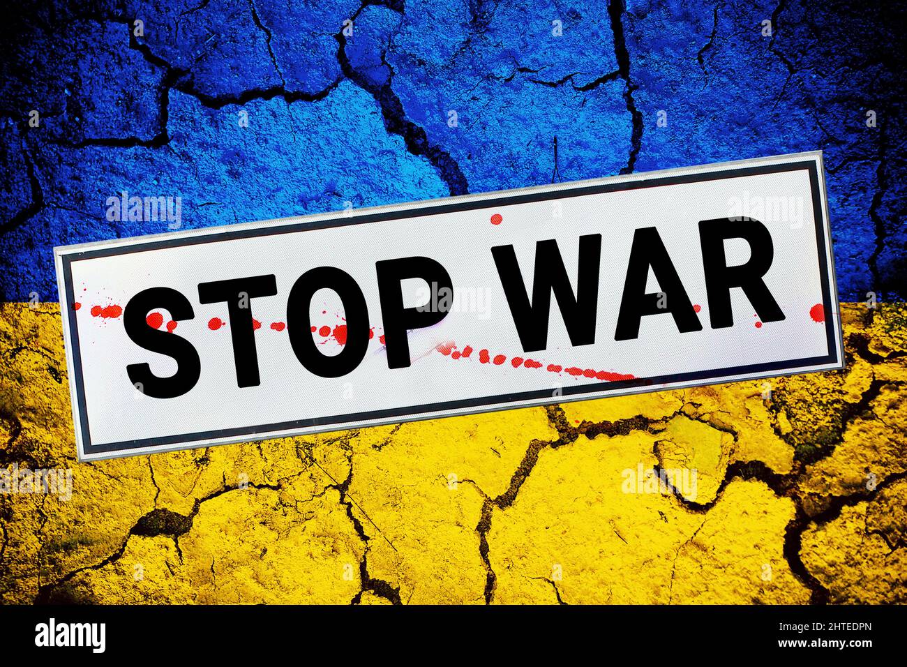 Word STOP WAR with blood splatter on a white road sign against the ...