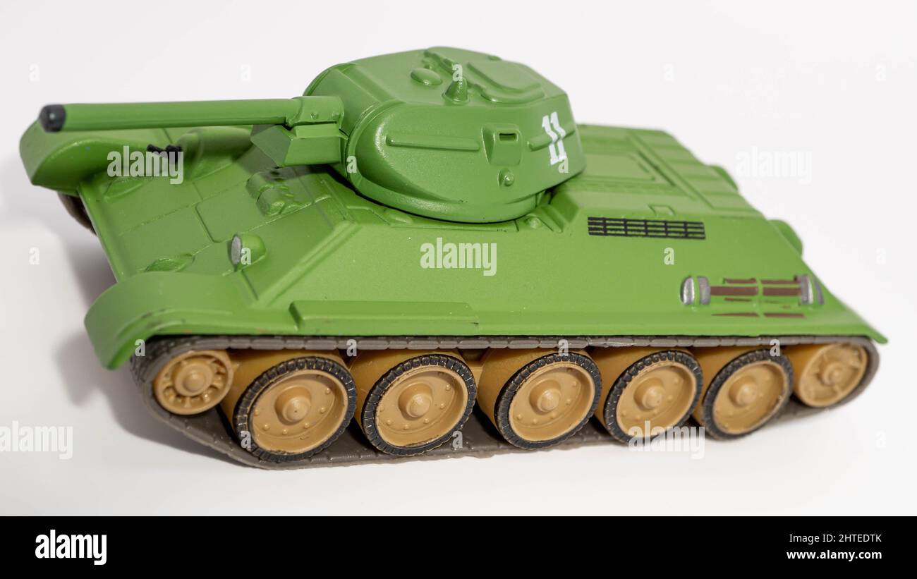 Closeup of a miniature T34-76 is a Soviet medium Russian tank isolated ...
