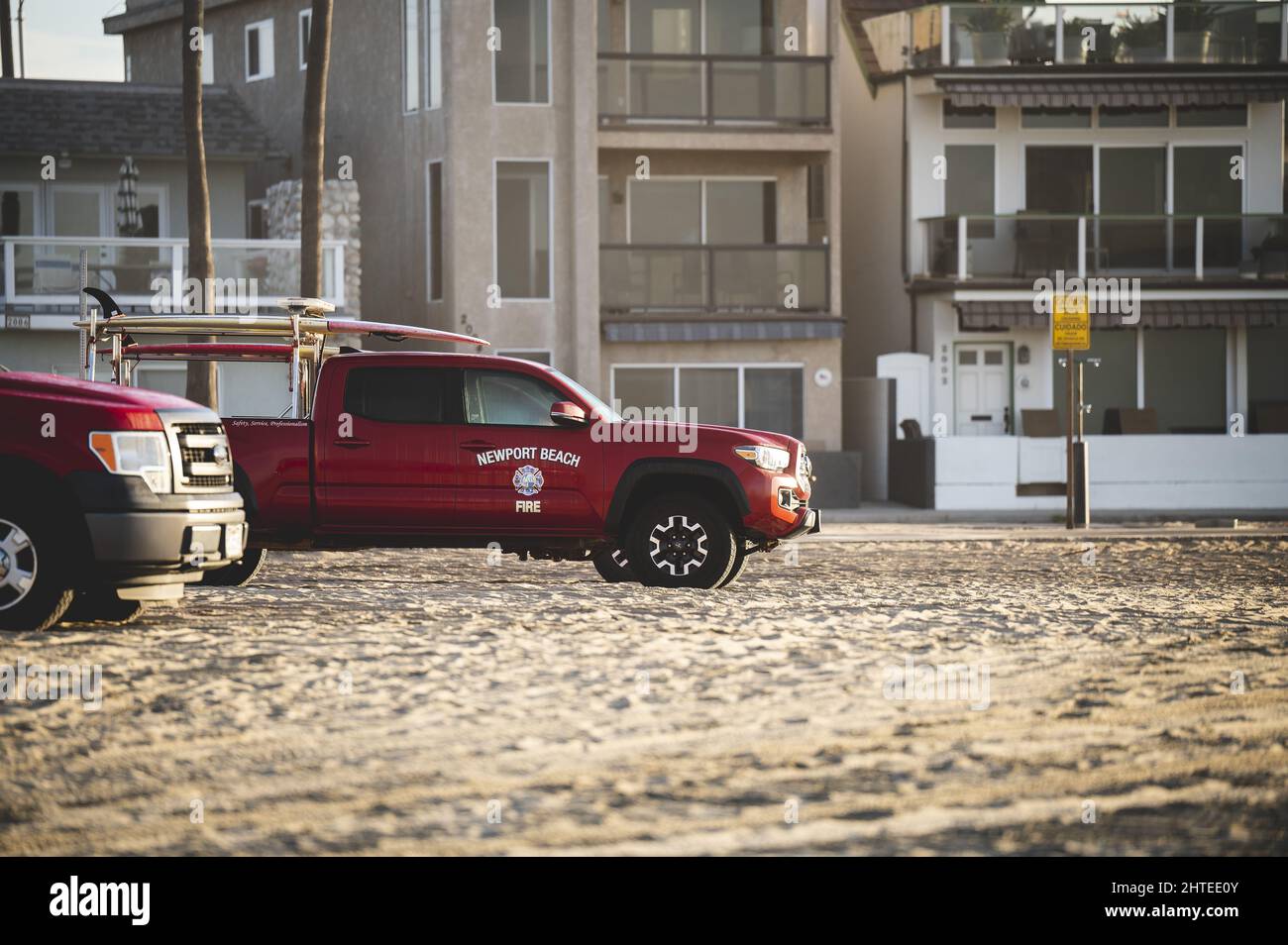 Side view of a lifeguard red car at Newport Beach in California Stock ...