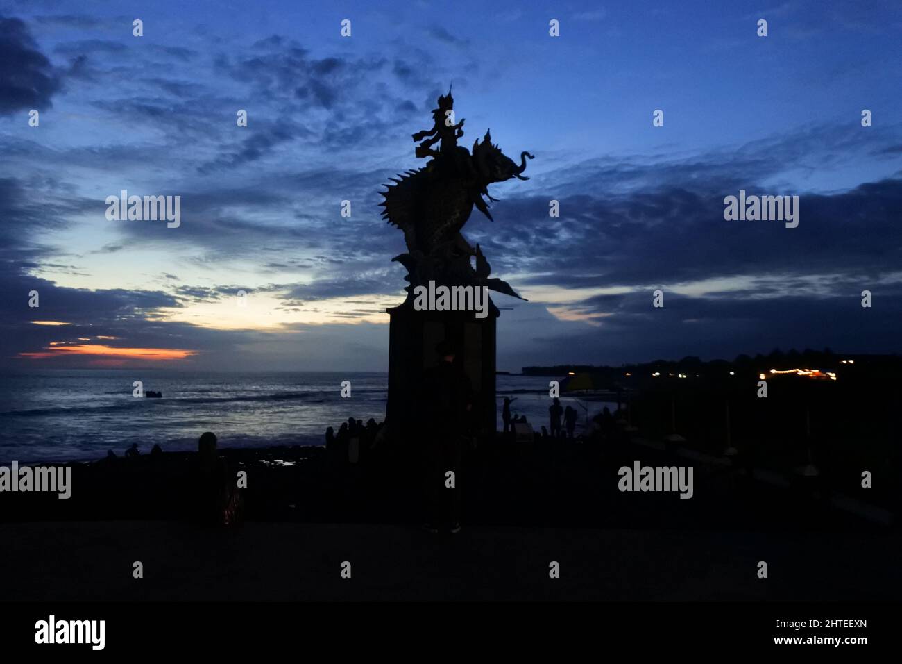Silhouette of Gajah Mina Statue on Jalan Pantai Pererenan beach. Bali ...