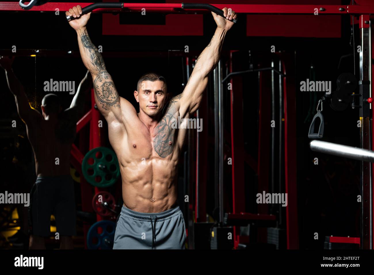 Athlete Performing Hanging Leg Raises Exercise Ab Exercises Stock Photo ...