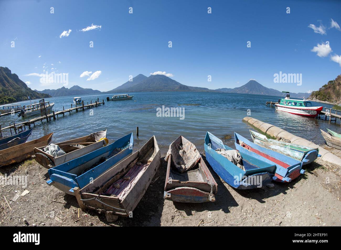 Lake Atitlan boats (Cayucos) lay on the shore at the public beach of ...