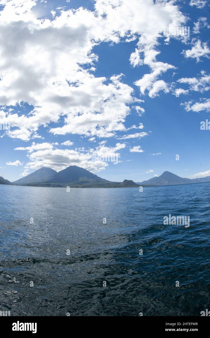 Lake Atitlan with Volcanoes as seen from Santa Catarina Palopo, Solola ...
