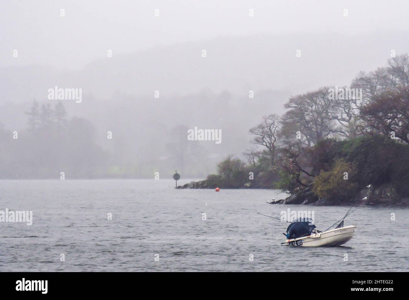 Fishing in the Rain on WIndermere Lake in the Lake District, UK Stock ...