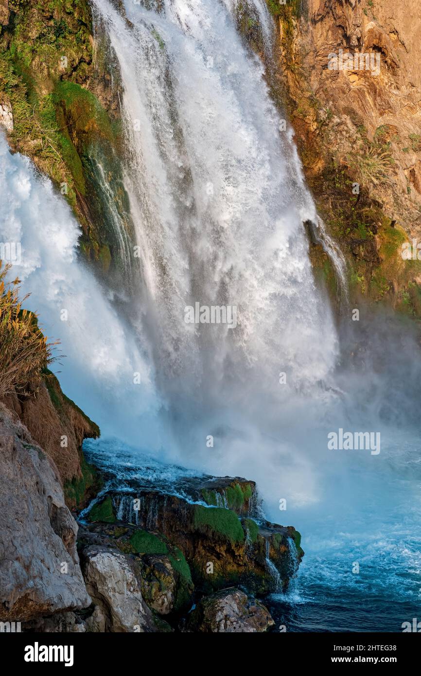 landscape at the foot of a large waterfall Stock Photo - Alamy