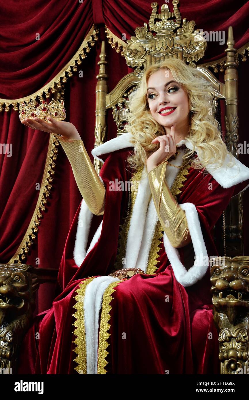 Portrait of a happy queen with crown Stock Photo - Alamy