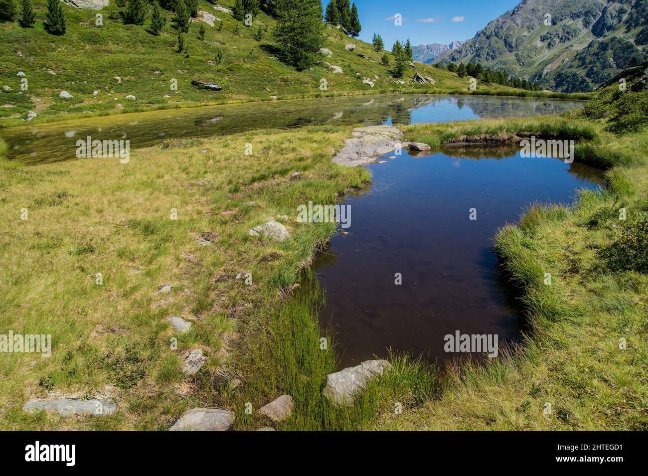 Serene landscape of a pond in the highlands in Italy Stock Photo - Alamy
