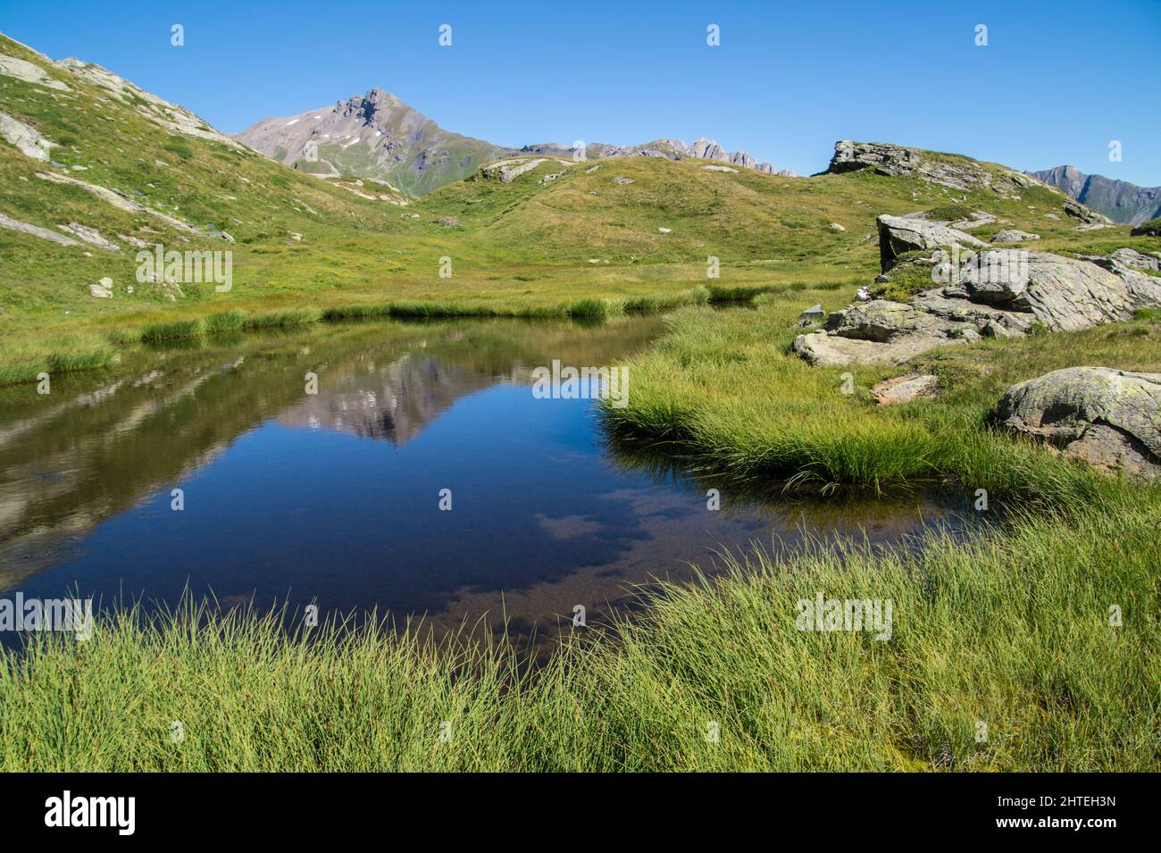Tranquil landscape of lake verney in the mountains of Italy Stock Photo ...