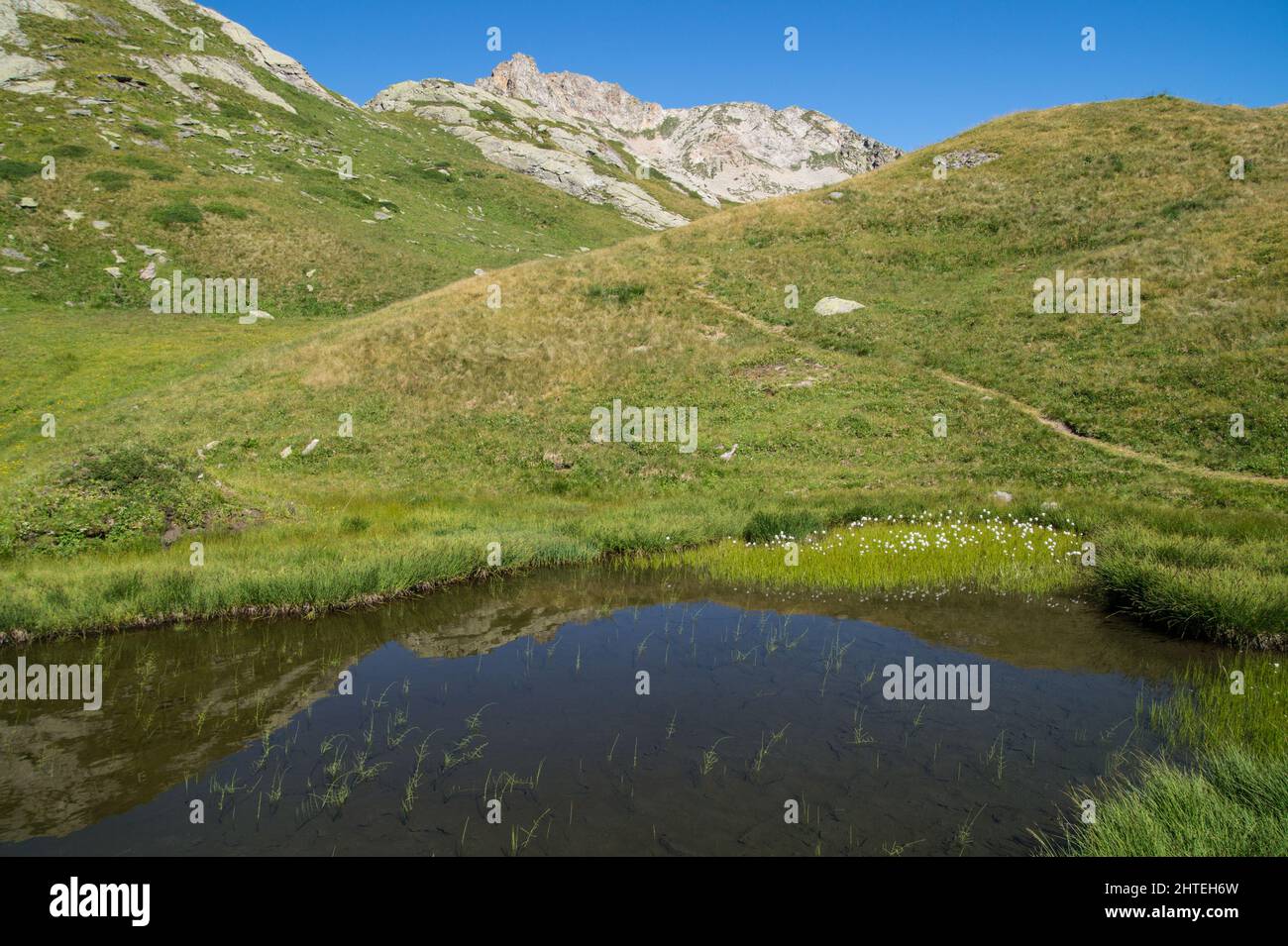 Tranquil landscape of lake verney in the mountains of Italy Stock Photo ...