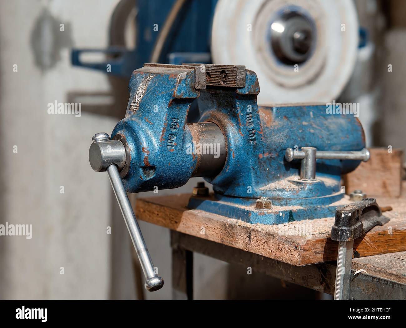 A closeup of the bench vise in the mechanical workshop Stock Photo - Alamy